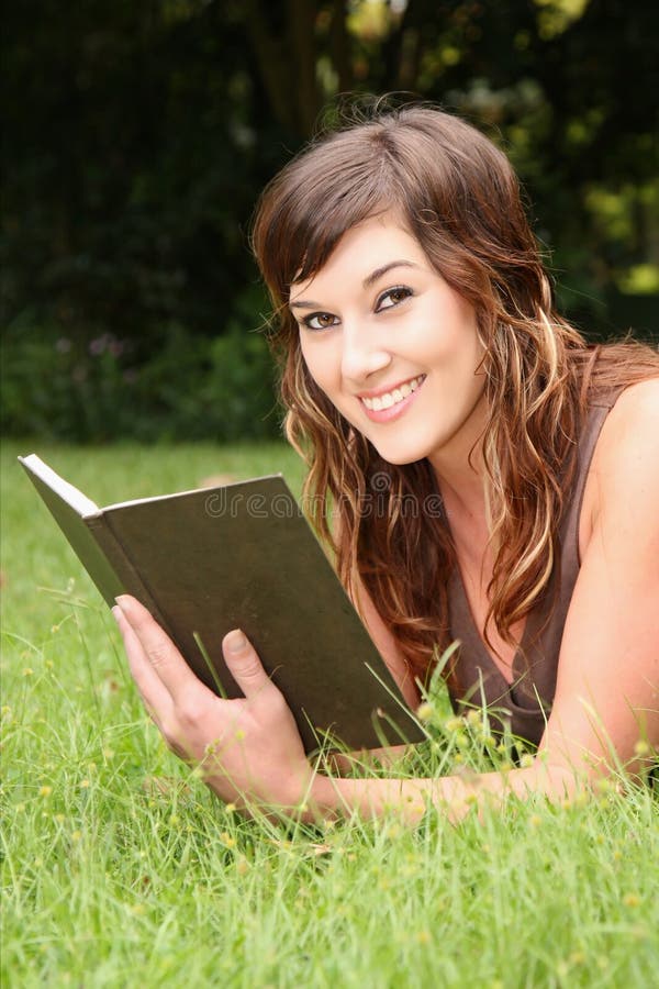 Pretty Girl Reading a Book stock photo. Image of pretty - 18051406