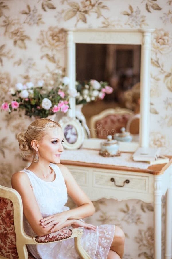 Pretty Girl in the Reflection of the Mirror Looks at Itself Stock Photo ...
