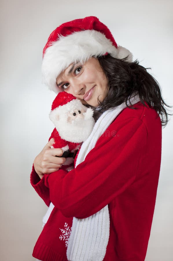 Pretty girl and santa stock image. Image of person, love - 17250501