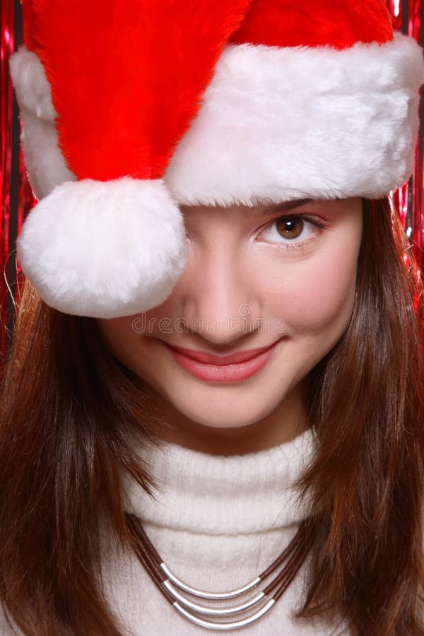 Pretty girl in Santa hat stock photo. Image of beauty - 12180360