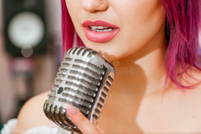 Pretty Girl Singing into Studio Microphone. Stock Image - Image of ...