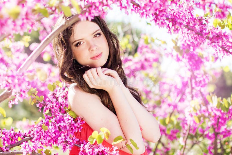 Pretty Girl in Spring Park with Pink Flowers Stock Photo - Image of ...