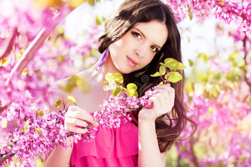 Pretty Girl in Spring Park with Pink Flowers Stock Image - Image of ...