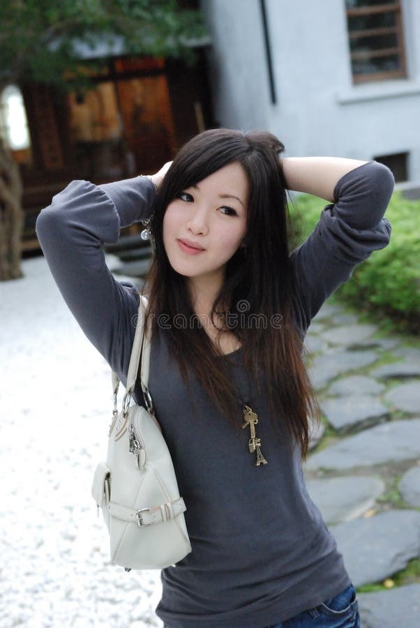 Pretty Girl Stand in a Yard Stock Photo - Image of standing, girl: 8170432