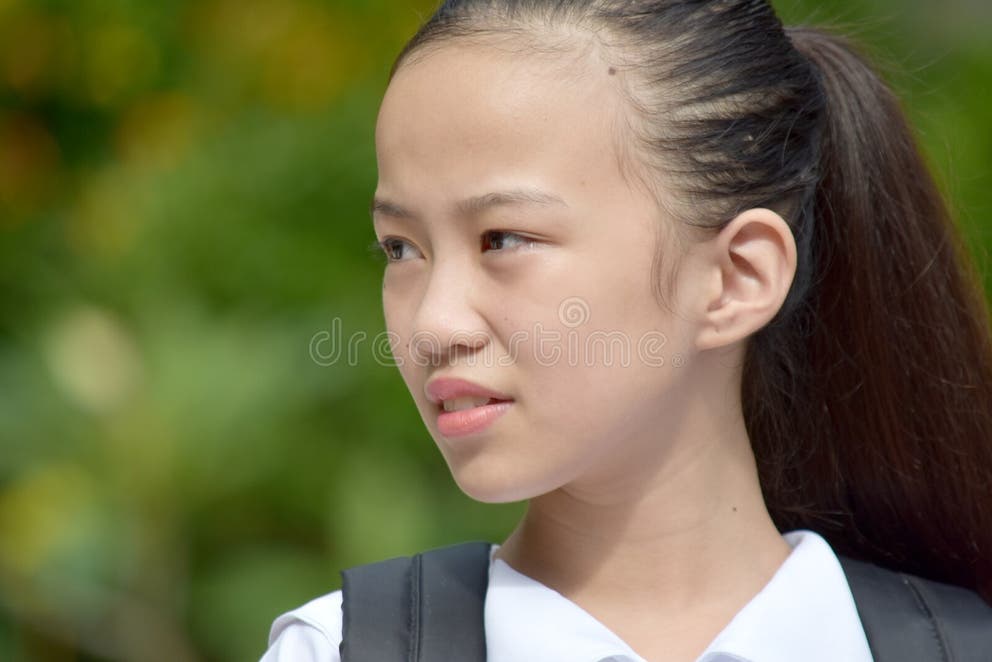 A Pretty Girl Student Staring Stock Photo - Image of juvenile, pupil ...