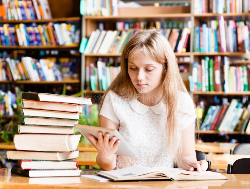 Pretty Girl with Tablet Computer Working in Library Stock Photo - Image ...