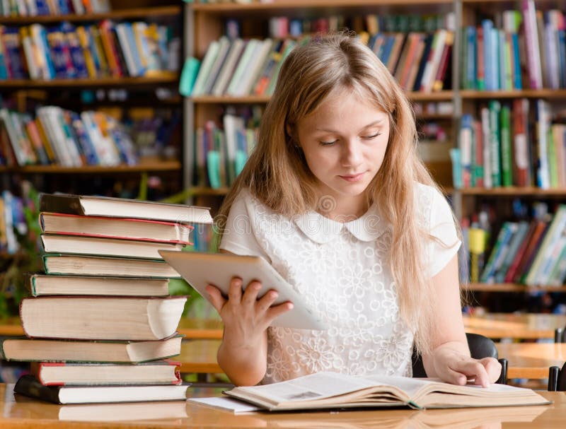 Pretty Girl with Tablet Computer Working in Library Stock Image - Image ...