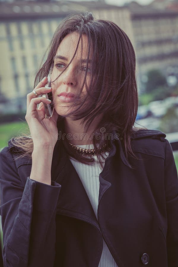 Pretty Girl Talking on Phone in the City Streets Stock Photo - Image of ...