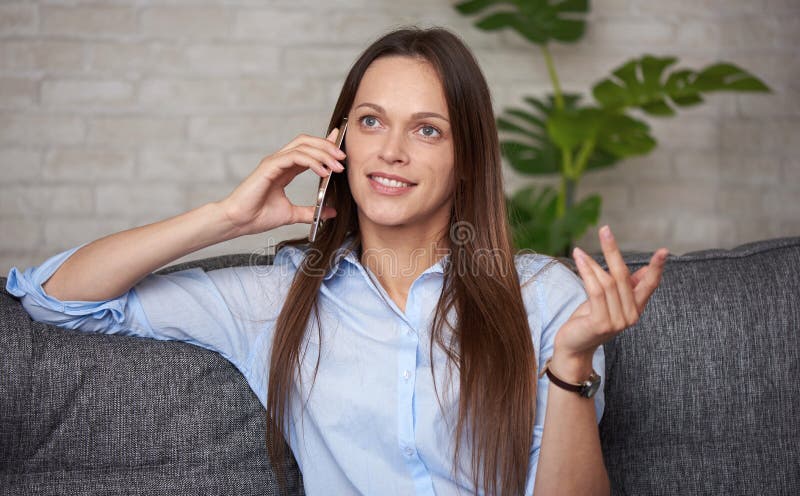 Pretty Girl is Talking on Phone at Home Stock Image - Image of holding ...