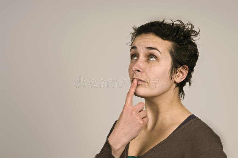 Pretty girl is thinking stock image. Image of creative - 8786311