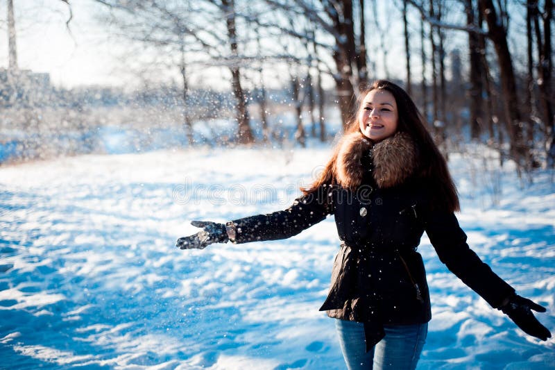 Pretty Girl Throws Snow in a Winter Park Stock Photo - Image of kids ...