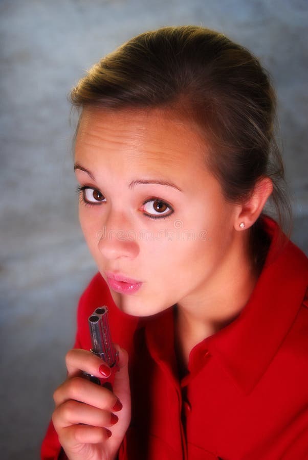 Pretty Girl with a Tiny Gun. Stock Image - Image of beautiful ...