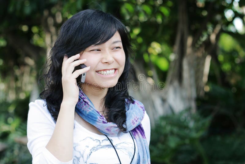 Pretty Girl Using a Cell Phone Stock Image - Image of cute, adult: 11579259