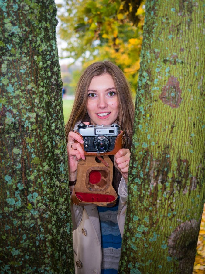 Pretty Girl with Vintage Camera in Park Stock Photo - Image of dress ...