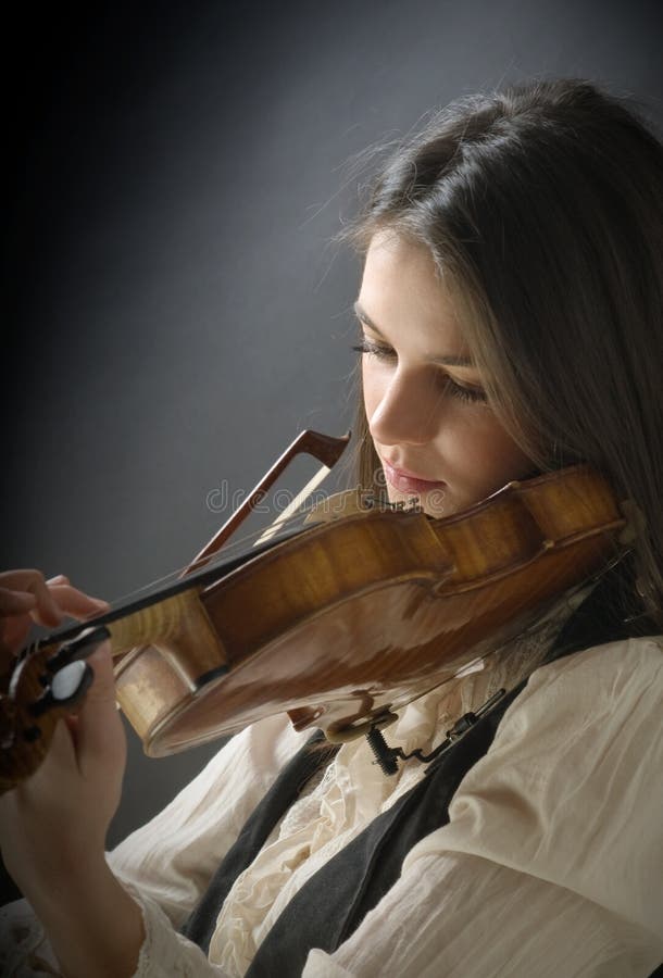 Pretty girl with violin stock image. Image of solo, musician - 21479263