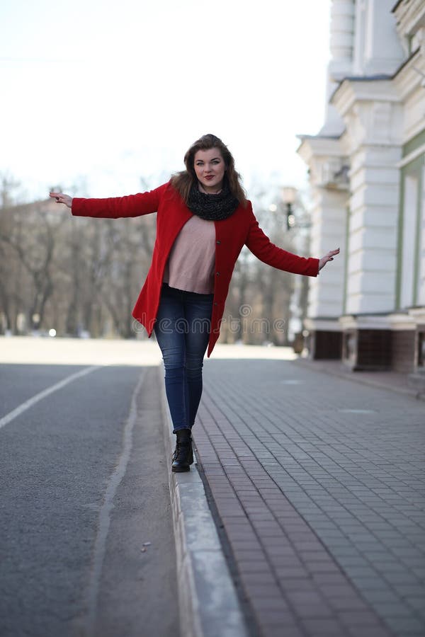 Pretty Girl on a Walk in Red Coat in the City Stock Image - Image of ...