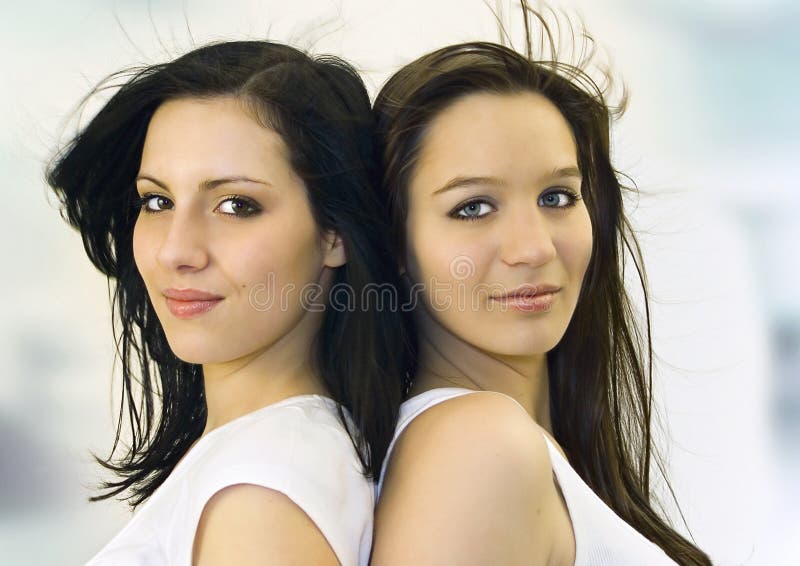 Pretty girls back to back stock image. Image of teen, friends - 5055055