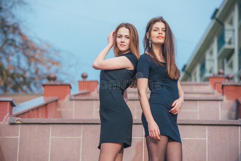 Pretty girls on a walk stock photo. Image of smile, street - 73526378