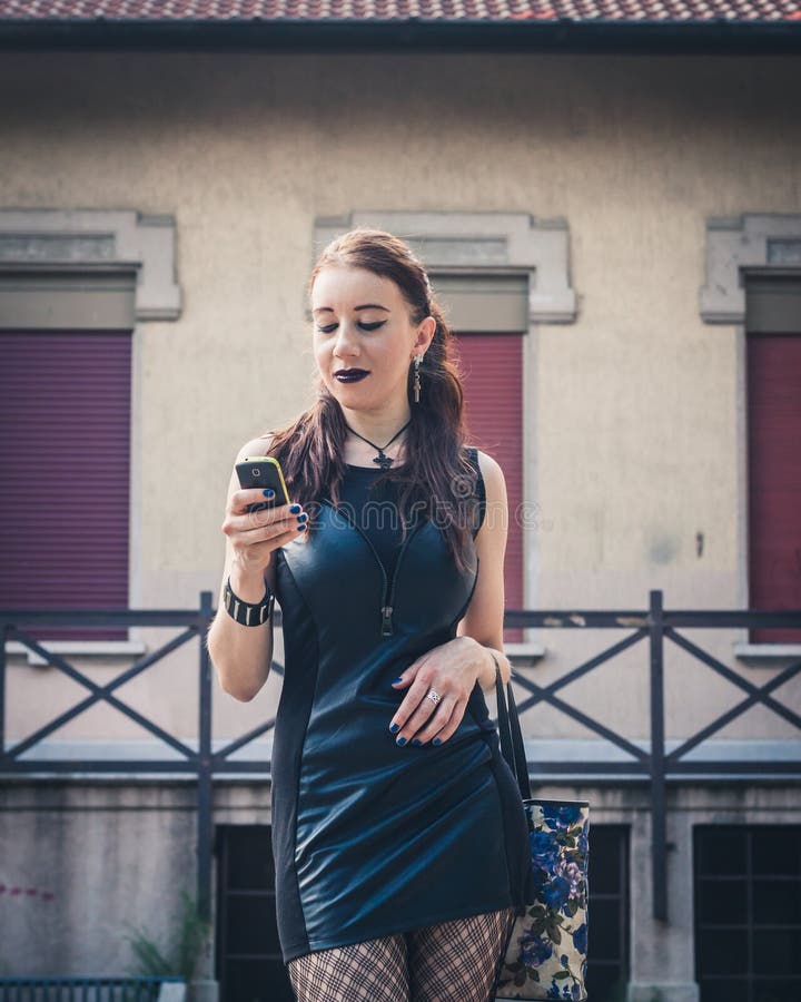 Pretty Goth Girl Using Phone in a City Park Stock Image - Image of goth ...