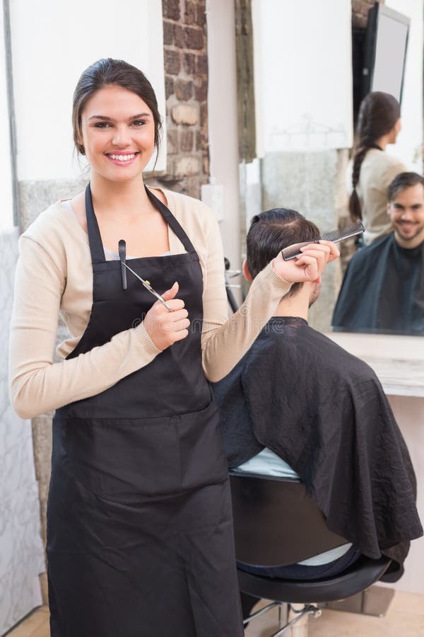 Pretty Hair Stylist Smiling at Camera Stock Photo - Image of young ...