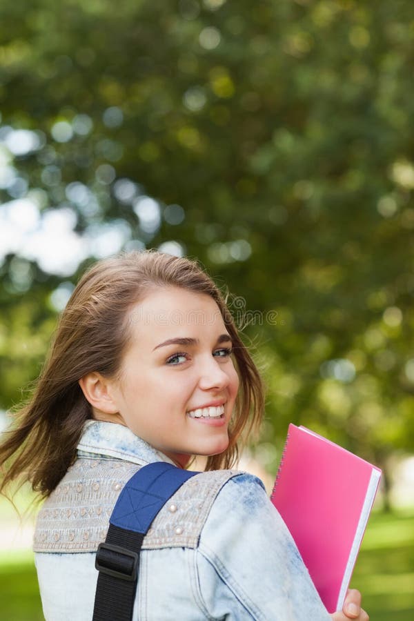 Pretty Happy Student Smiling at Camera Carrying Notebook Stock Image ...