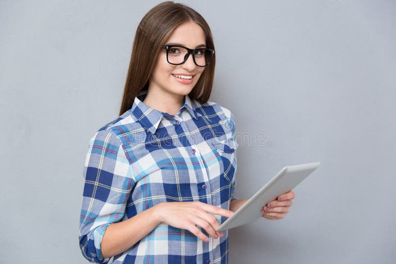 Pretty Happy Student Using Tablet and Smiling Stock Photo - Image of ...