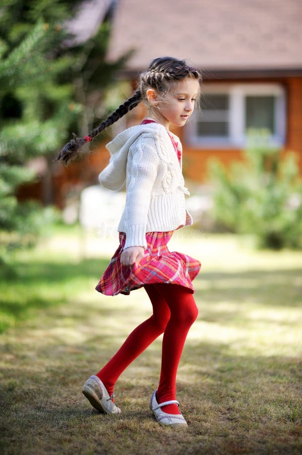 Pretty Kid Girl Dancing Outdoors Stock Photo - Image of caucasian ...