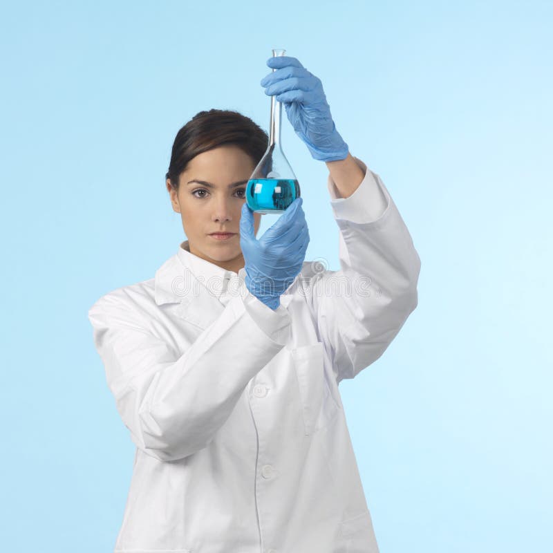 Pretty Lab Worker Holding a Chemistry Flask Stock Image - Image of ...