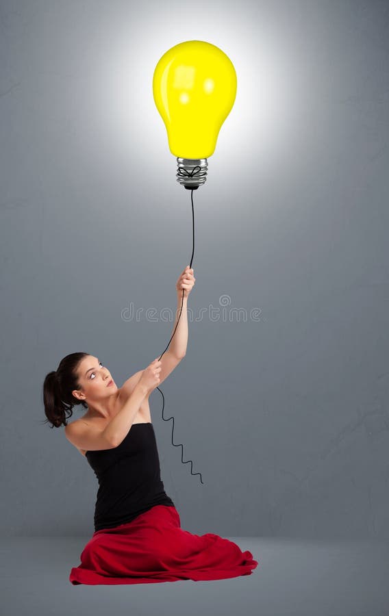 Pretty Lady Holding a Light Bulb Balloon Stock Image - Image of ...
