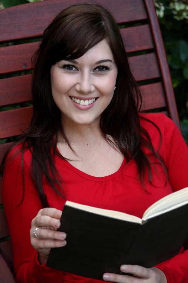 Pretty Lady Reading Book stock photo. Image of portrait - 13458212