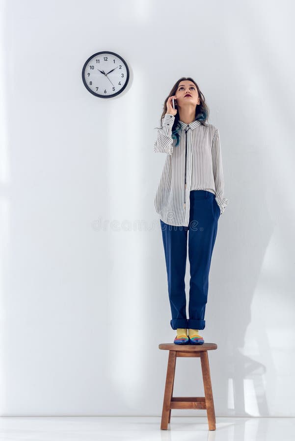 Pretty Lady Talking on the Phone while Standing Stock Photo - Image of ...