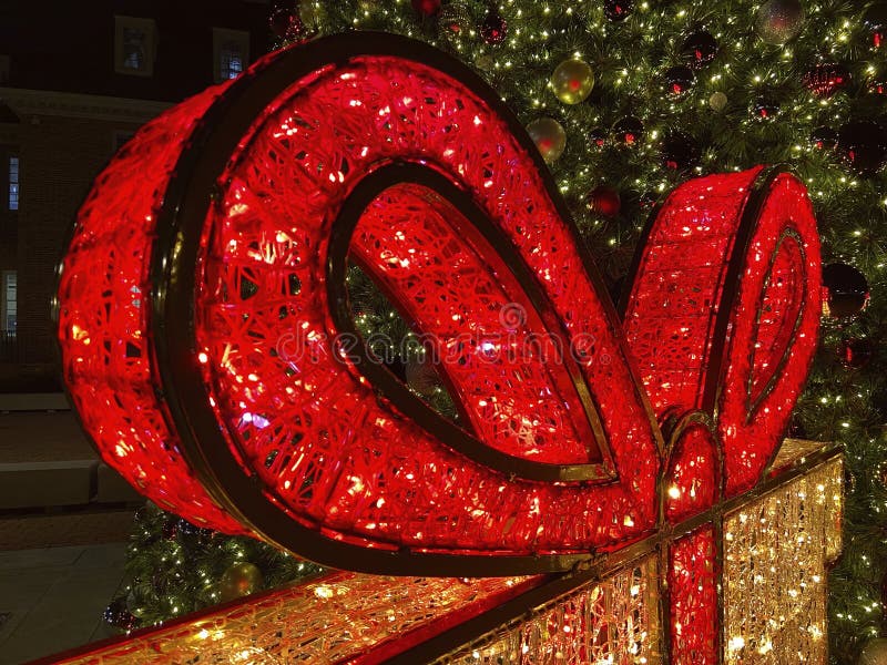 Pretty Lighted Red Christmas Bow and Box at Night Stock Photo - Image ...