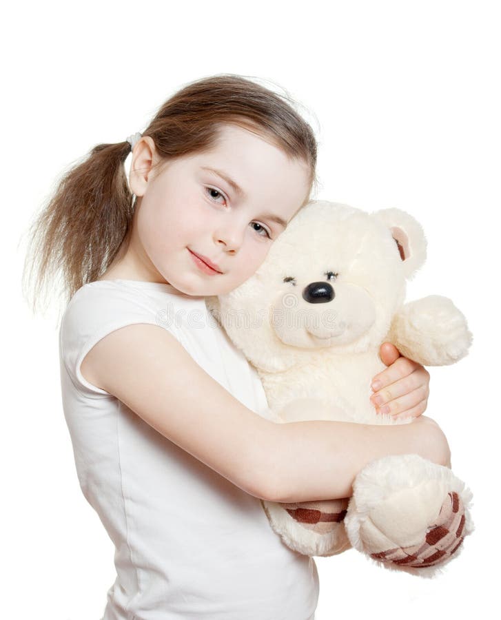 The Pretty Little Girl Embraces a Teddy Bear Stock Photo - Image of ...