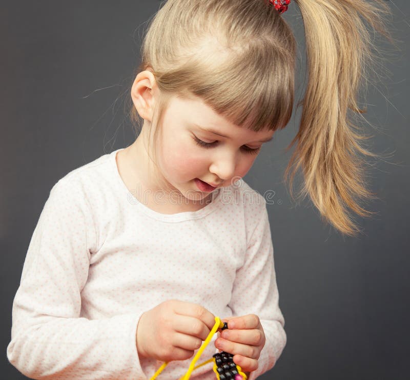 Child Threading Stock Photos - Free & Royalty-Free Stock Photos from ...