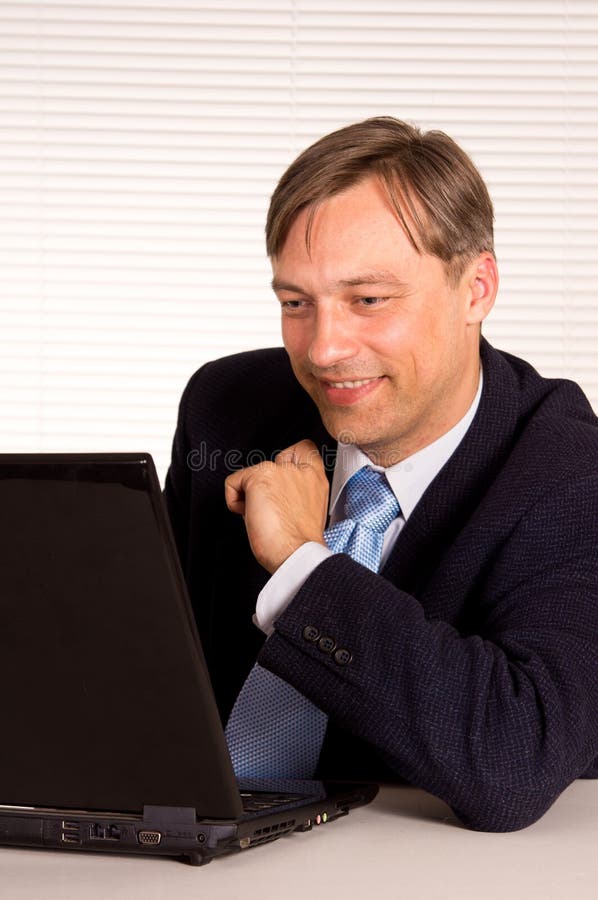 Pretty man at computer stock image. Image of office, manager - 21236567