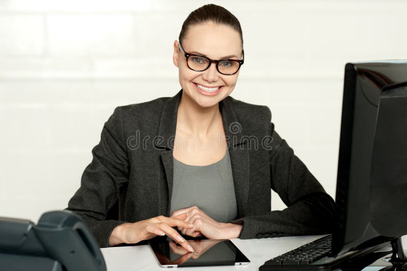 Pretty Manager Working on Wireless Tablet Device Stock Photo - Image of ...