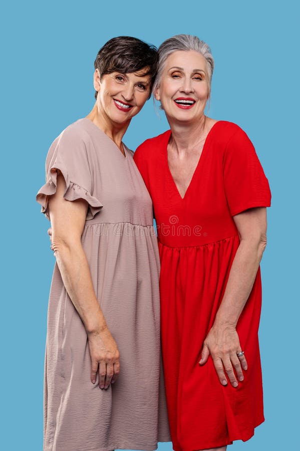 Pretty Mature Ladies in Dresses Looking Happy Stock Image - Image of ...