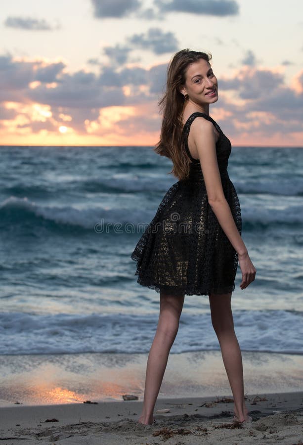 Pretty Model in a Black Dress. Stock Photo - Image of style, smile ...