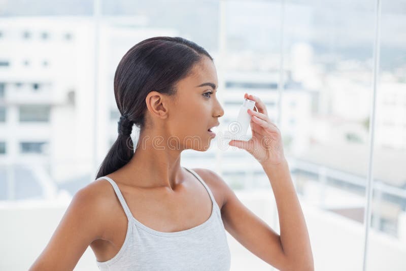 Pretty Model Using Her Asthma Atomizer Stock Image - Image of domicile ...