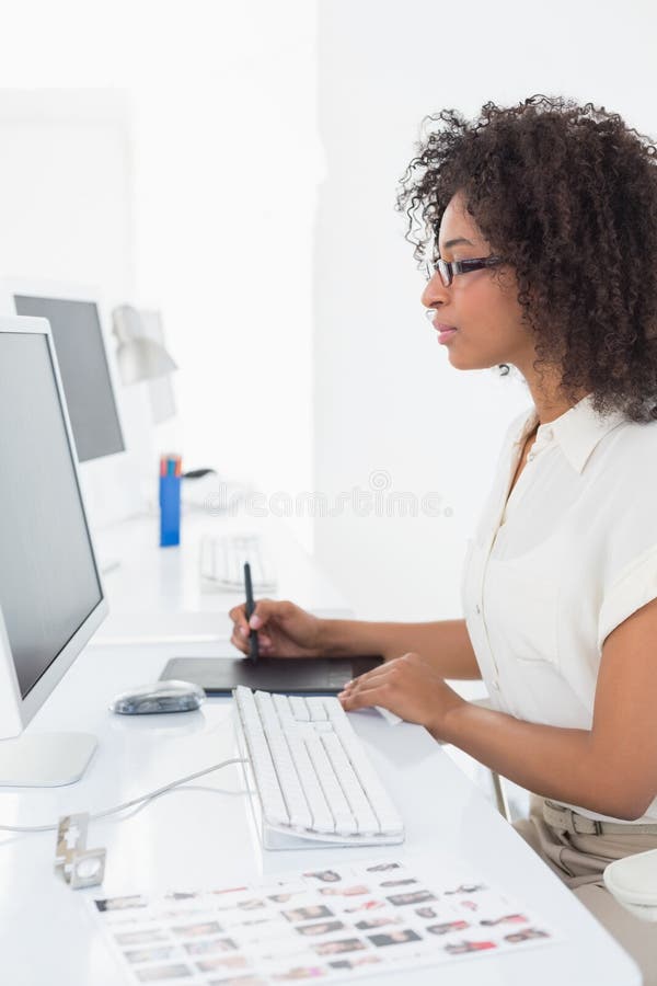 Pretty Photo Editor Using Digitizer at Desk Stock Image - Image of ...