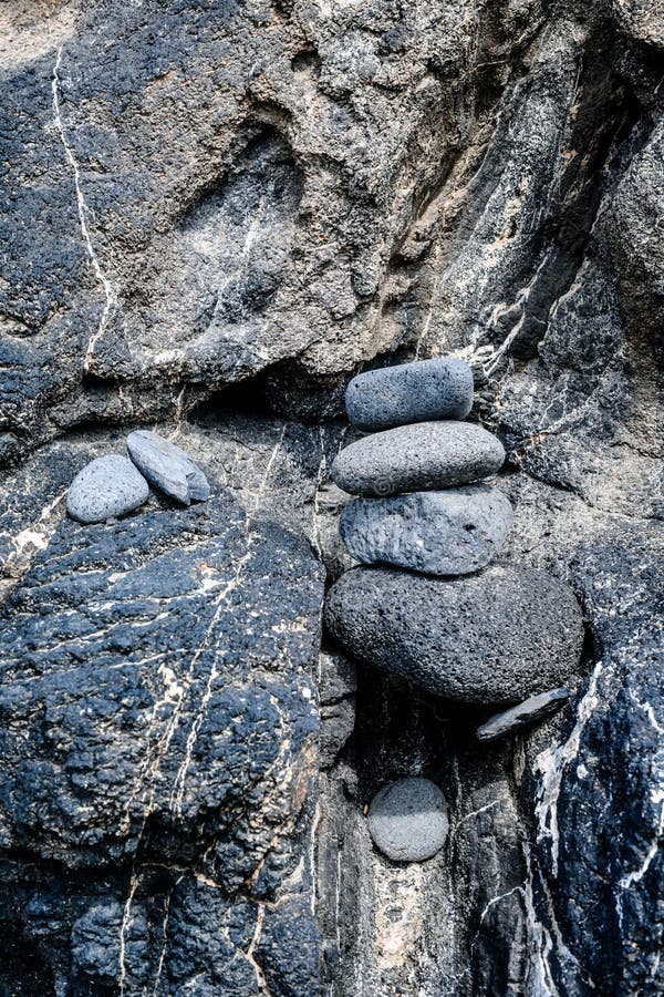 Pretty Pile of Pebbles between the Rocks Stock Image - Image of ...