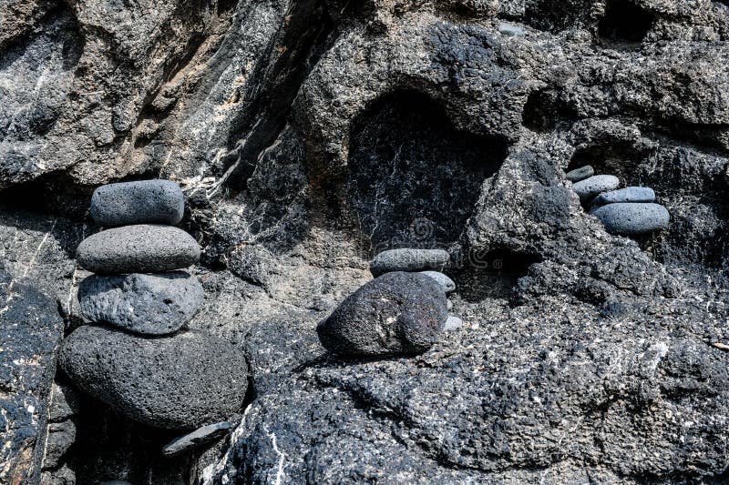 Pretty Pile of Pebbles between the Rocks Stock Photo - Image of coast ...