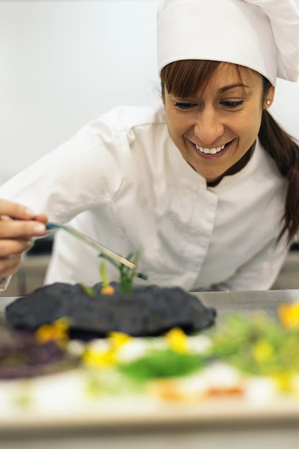 Pretty Professional Chef Cooking. Stock Image - Image of occupation ...