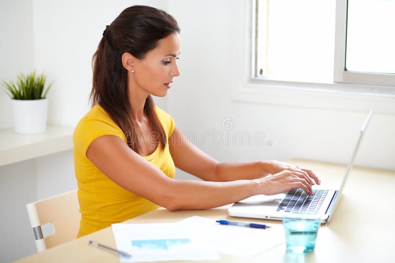 Pretty Receptionist Sitting while Surfing the Web Stock Photo - Image ...