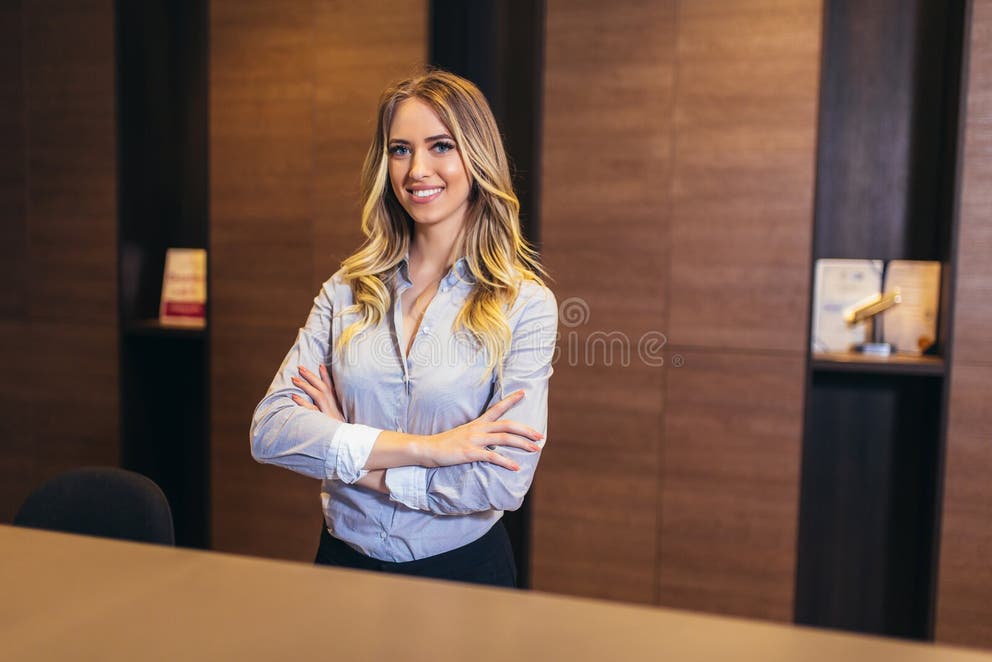 Pretty Receptionist at Work Stock Photo - Image of friendly, portrait ...