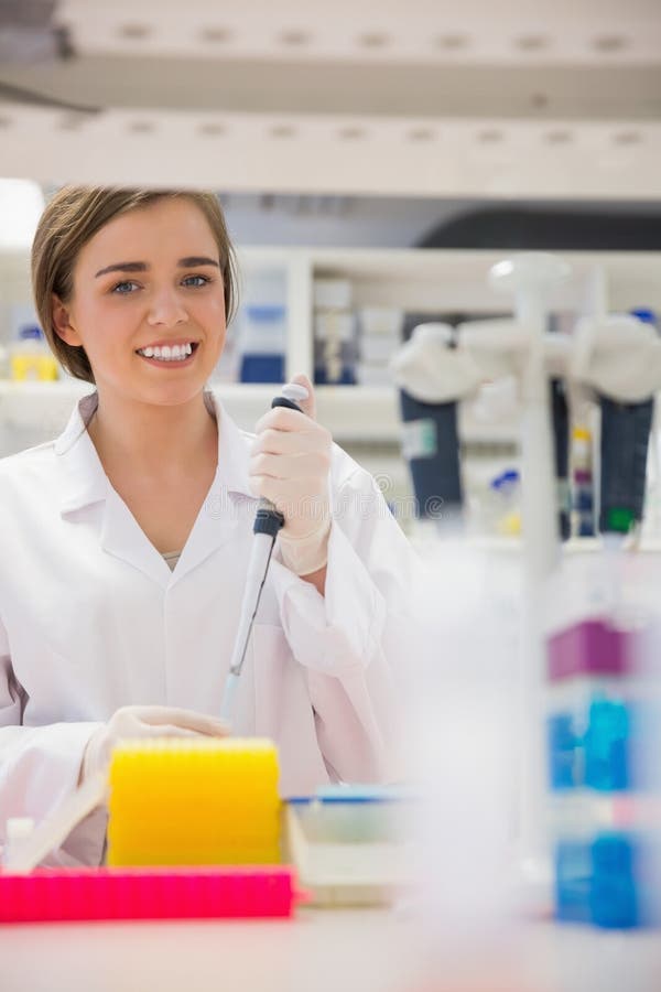 Pretty Science Student Smiling and Showing Vial Stock Photo - Image of ...