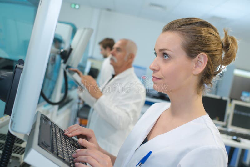 Pretty Scientist Doing Research in Lab with Computer Stock Image ...