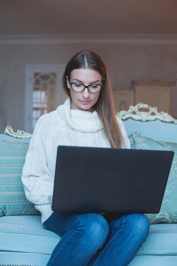 Pretty Serious Woman Working Using Laptop at Home Stock Photo - Image ...