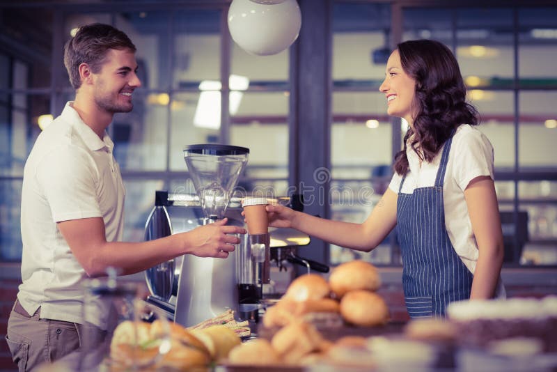 Pretty Smiling Barista Serving a Customer Stock Image - Image of female ...