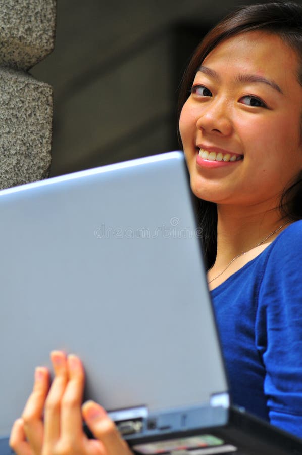 Pretty Smiling Chinese Girl Carrying Notebook Stock Photo - Image of ...
